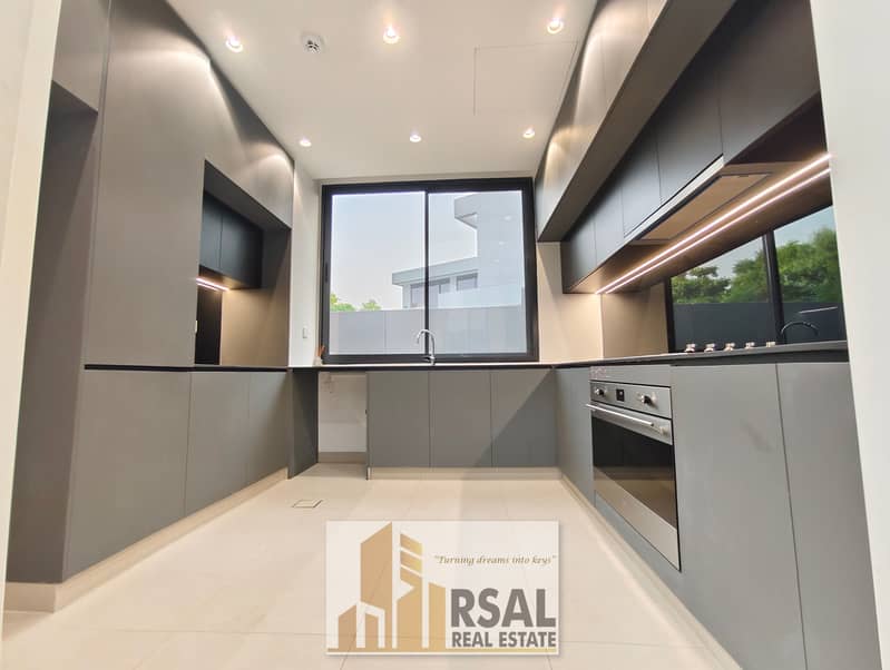 Gated community Luxurious 4BR with private pool Majlis Room | Bayut.com