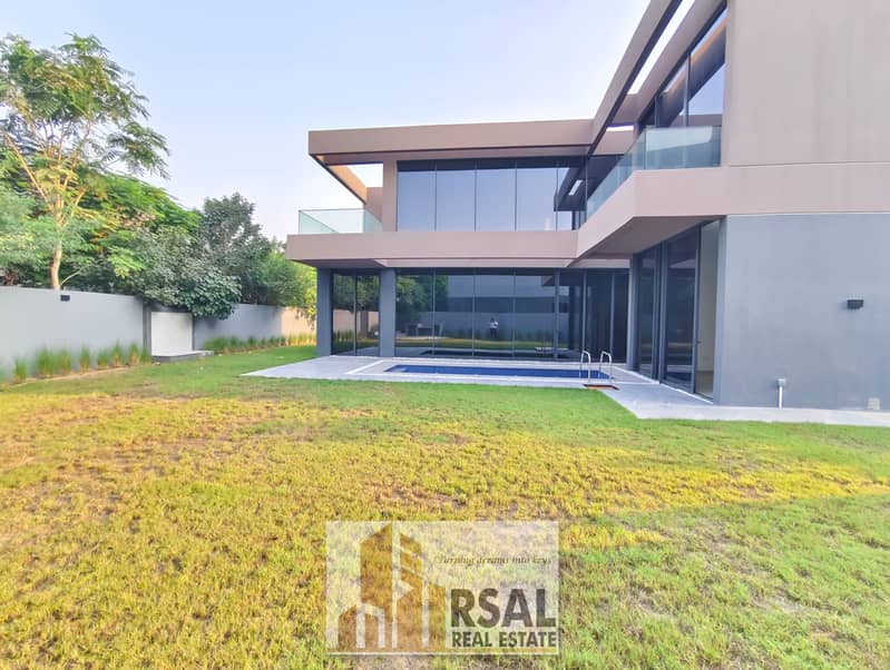 Gated community Luxurious 4BR with private pool Majlis Room | Bayut.com