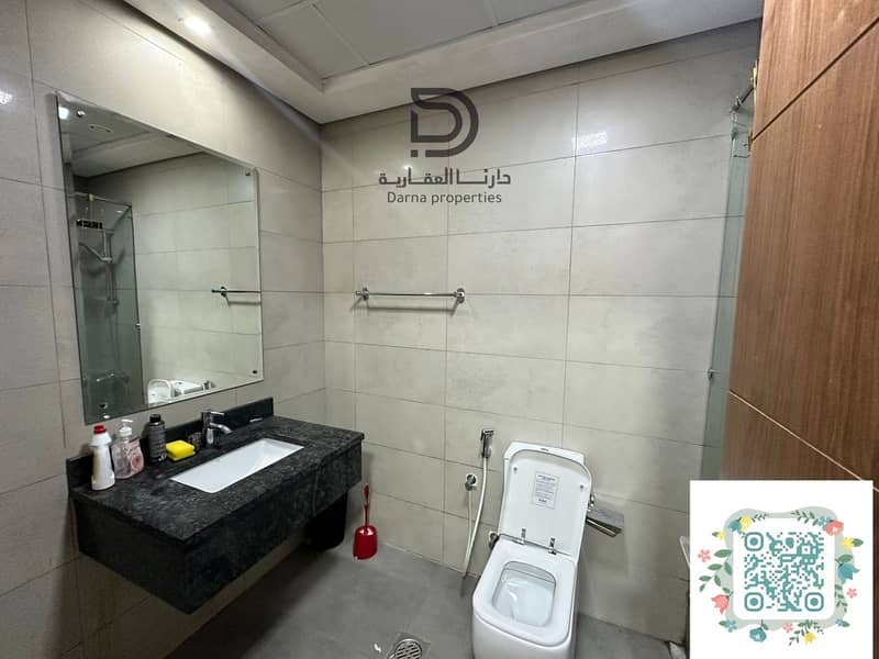 One-bedroom apartment for sale in Al Nuaimiya One Tower with a modern ...