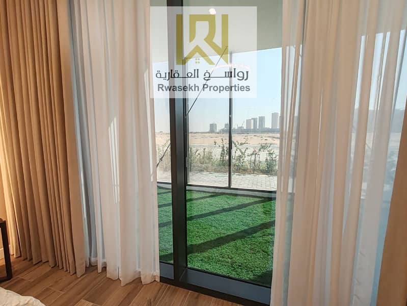 Project: Tiger Downtown Ajman Handover Q4 2028 A lagoon-front master ...