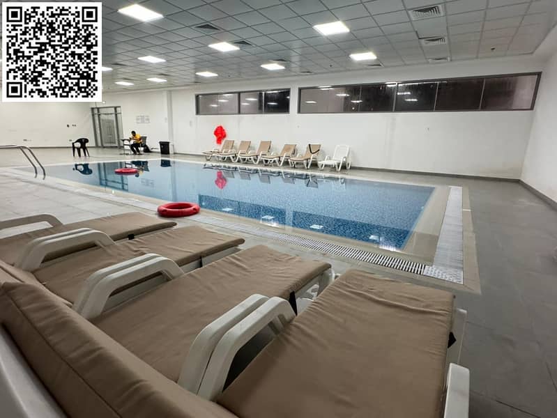 Swimming pool, gym, bedroom and living room with luxury hotel ...