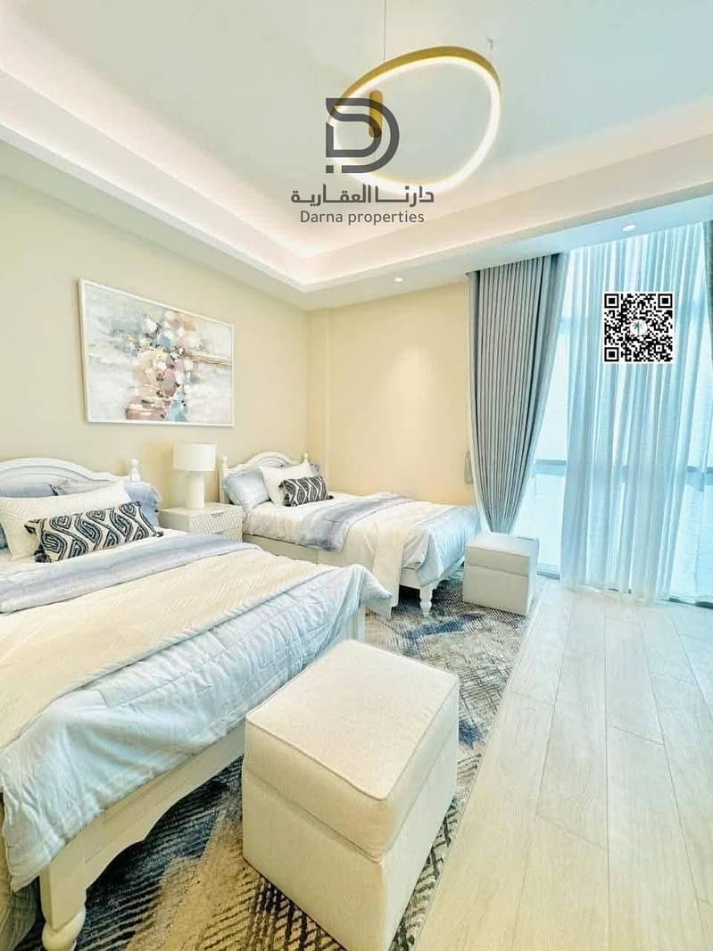 Al Khour Towers, two-bedroom apartment with a living room for sale ...