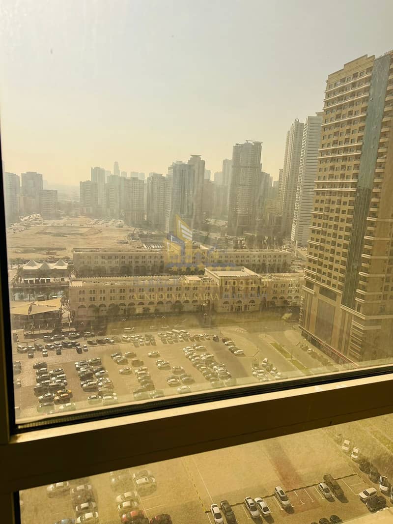 Two bedrooms and a living room for rent in Rose Tower, Sharjah | Bayut.com