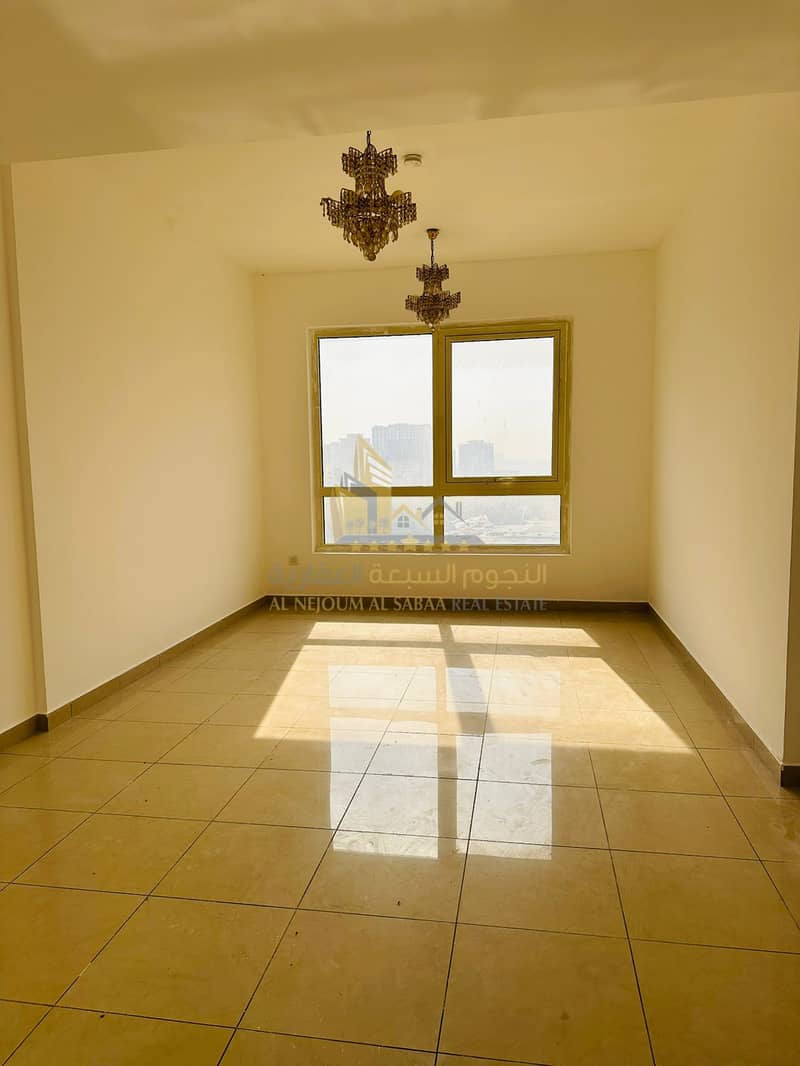 Two bedrooms and a living room for rent in Rose Tower, Sharjah | Bayut.com