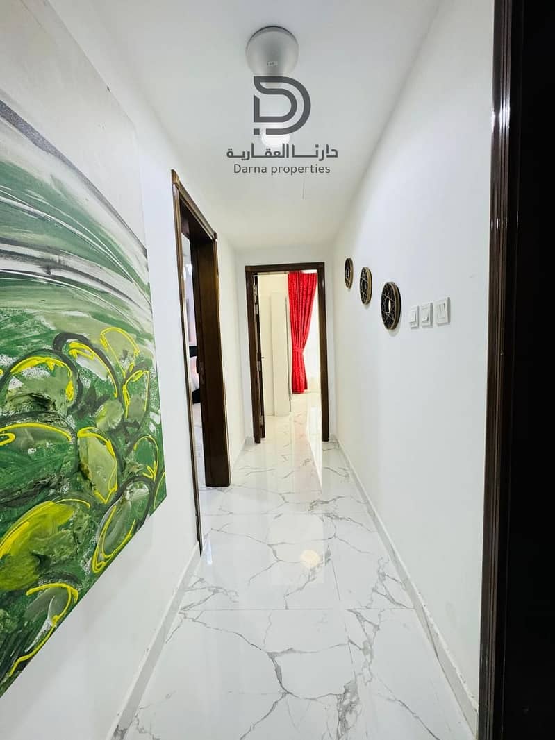 Own a spacious 2-bedroom apartment with living room in Al Waha Towers ...