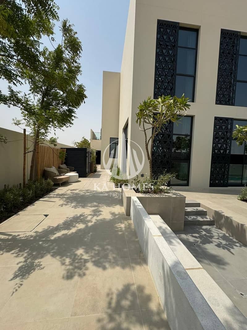 Own a luxury villa in a strategic location on the border of Dubai ...