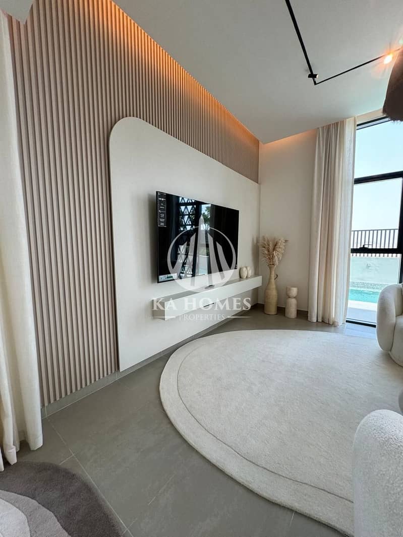 Own a luxury villa in a strategic location on the border of Dubai ...