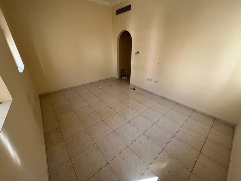 One bedroom and living room, central air conditioning, family building ...