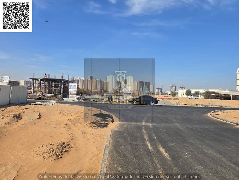 For sale: Townhouse plot opposite a park and mosque, behind the new Al ...