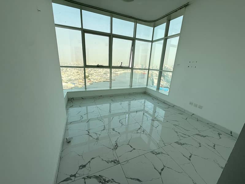 Two rooms in Al Waha Towers, prime location close to all services, easy ...
